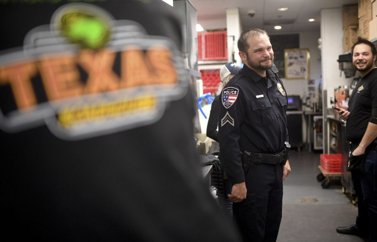 Lehi police bus tables for a cause | News, Sports, Jobs - Daily Herald